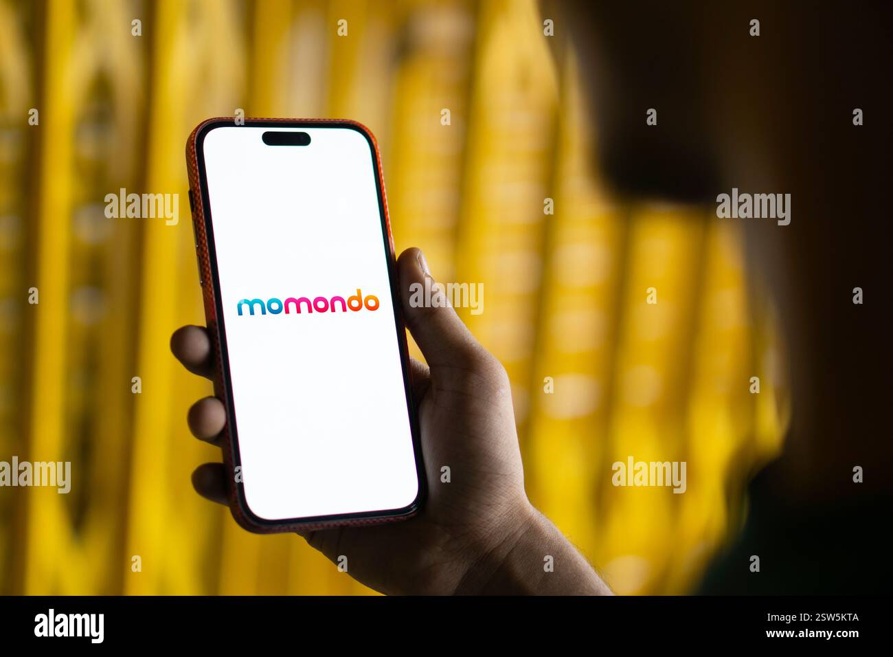 Dhaka, Bangladesh- 26 Sep 2024: Momondo logo is displayed on smartphone ...
