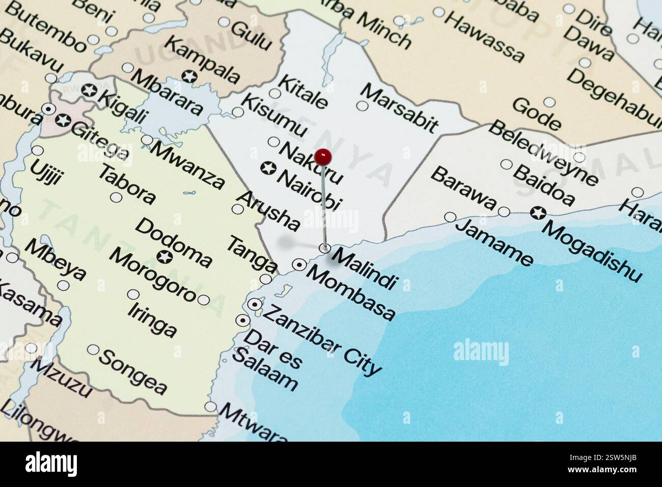 red pin needle into malindi city of kenya political map Stock Photo - Alamy