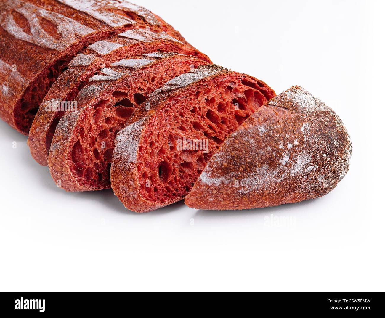 Sliced beetroot artisan bread on white background Stock Photo - Alamy