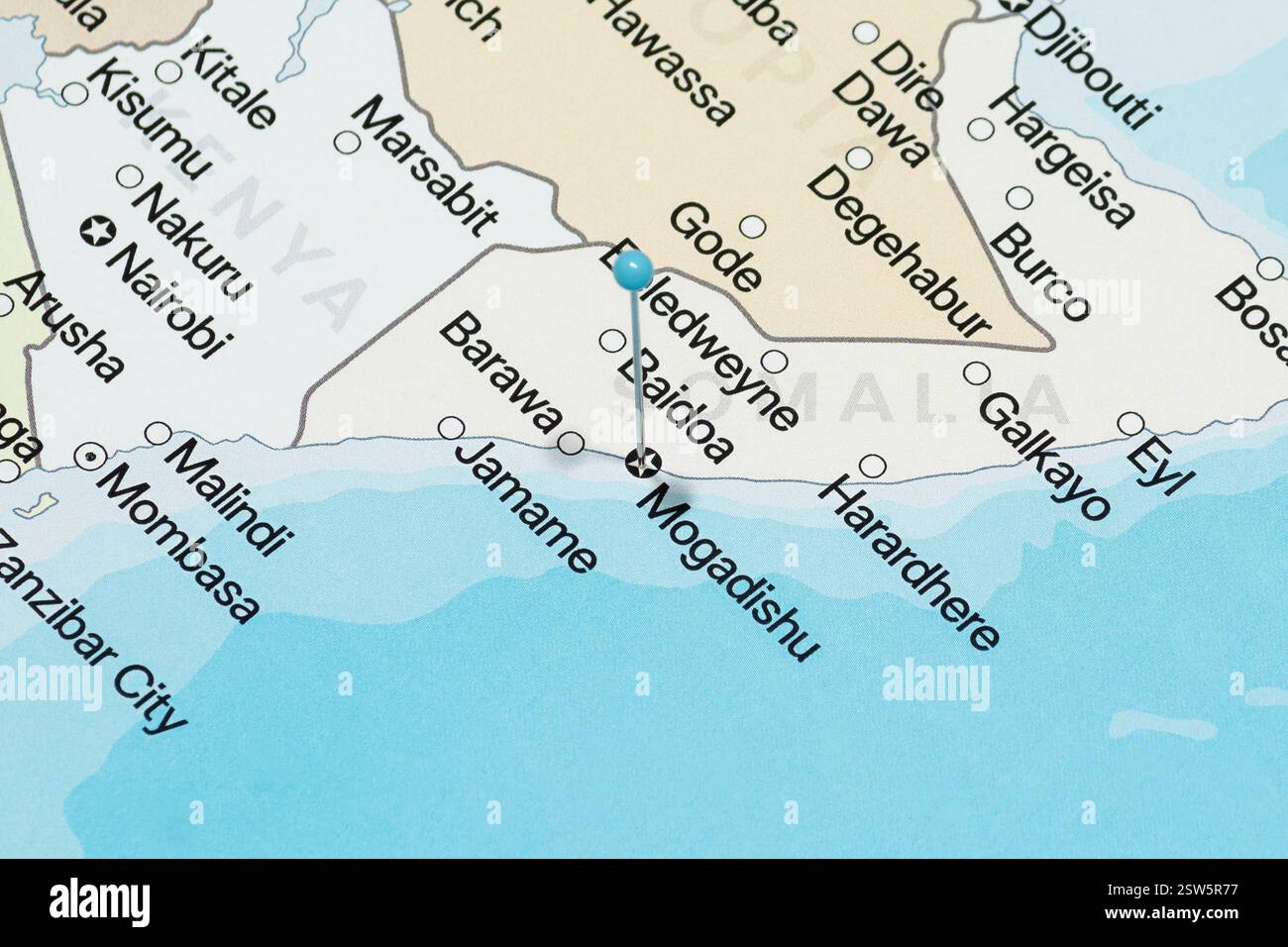 light blue pin needle into mogadishu city of somalia political map ...