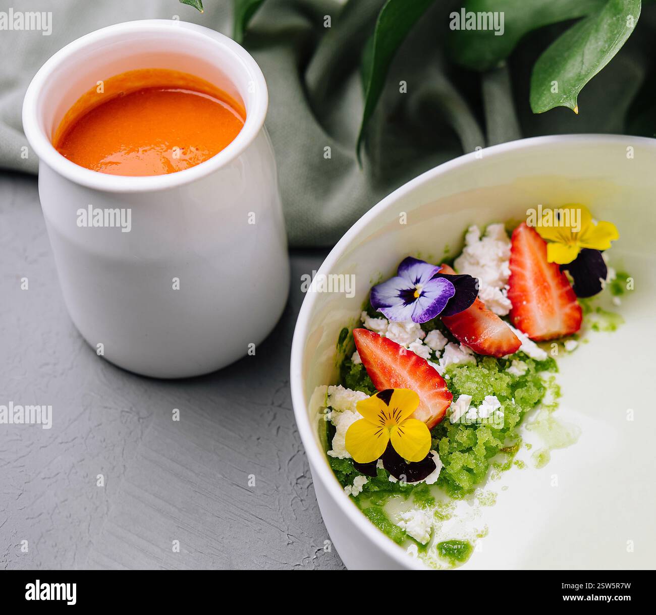 Healthy breakfast bowl with edible flowers Stock Photo - Alamy