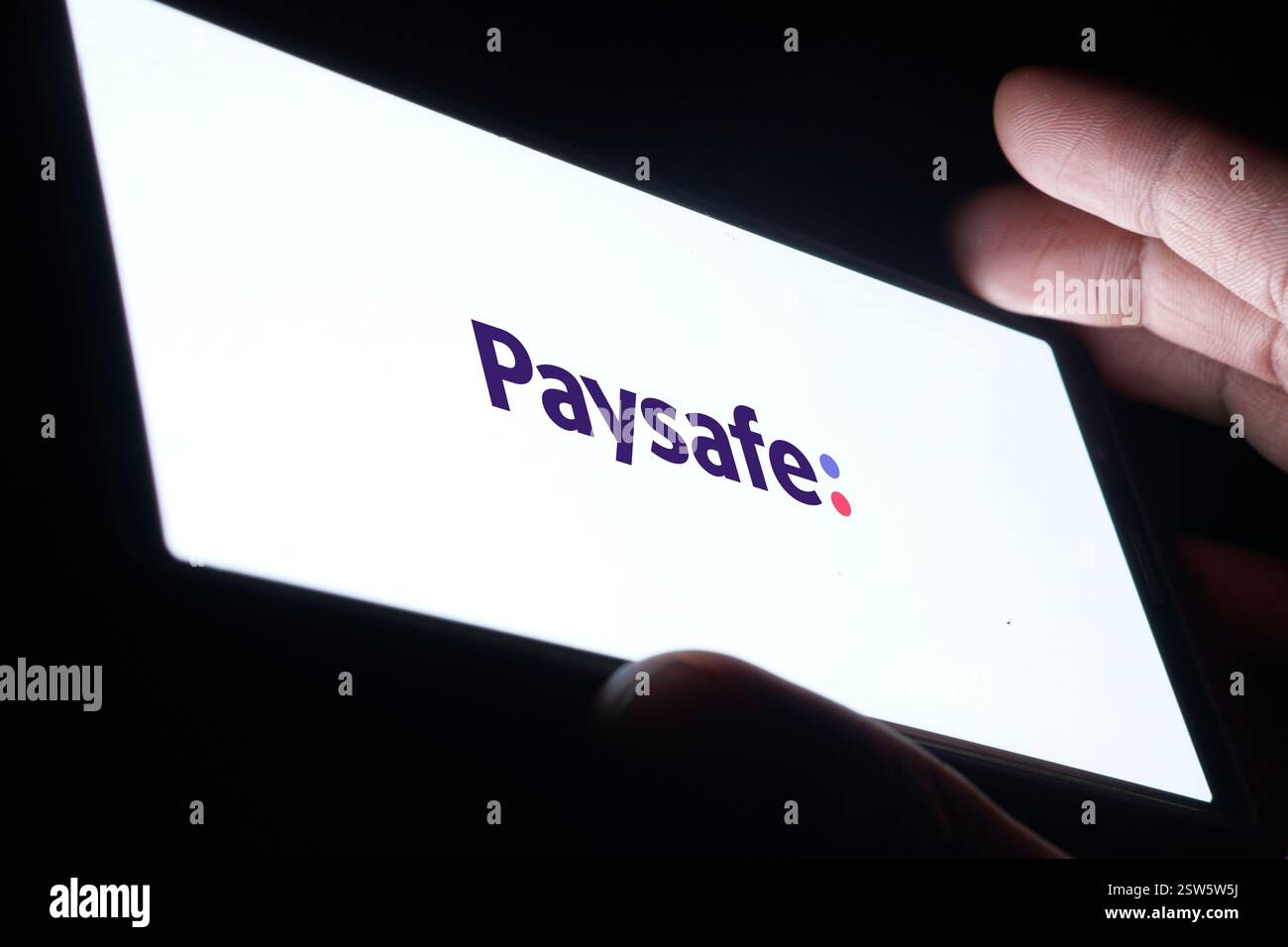 Dhaka, Bangladesh- 28 Sep 2024: Paysafe logo is displayed on smartphone ...