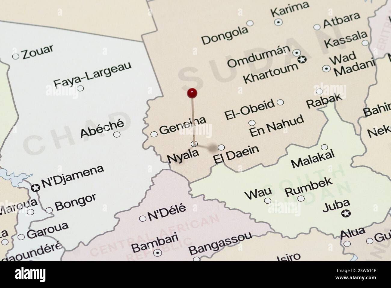 red pin needle into nyala city of sudan political map Stock Photo - Alamy