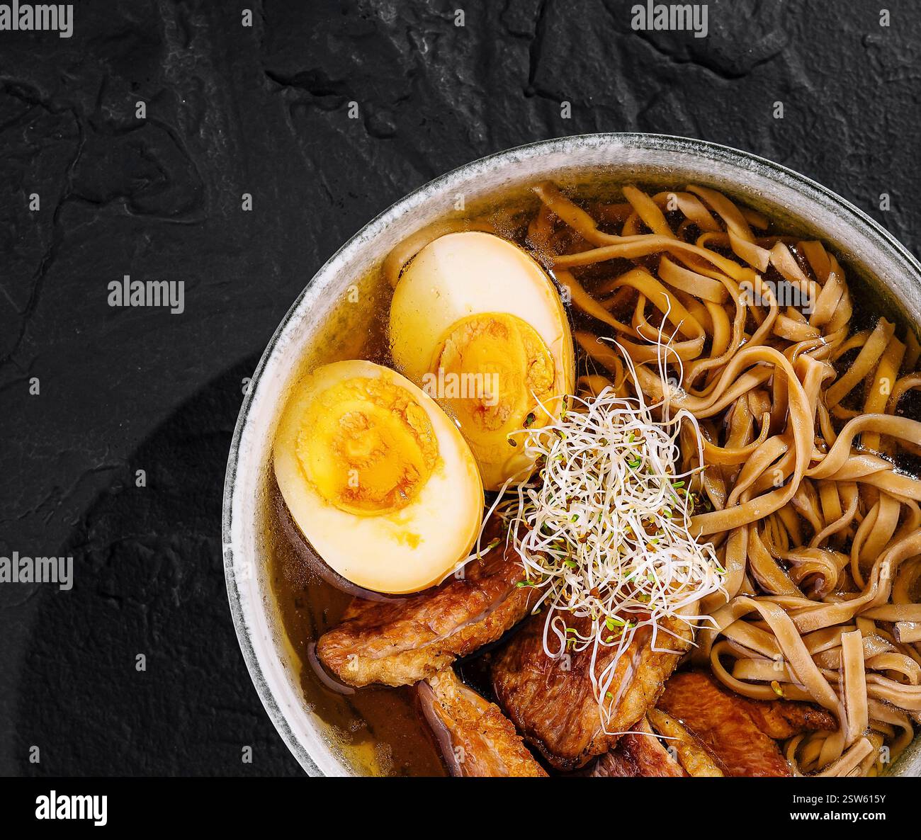Savory ramen bowl with eggs and pork Stock Photo - Alamy