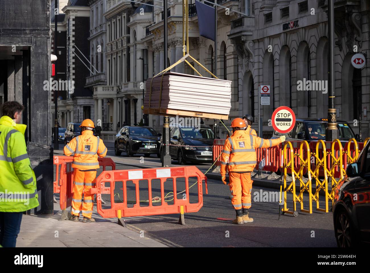 Construction workers on building project situated along Pall Mall in ...