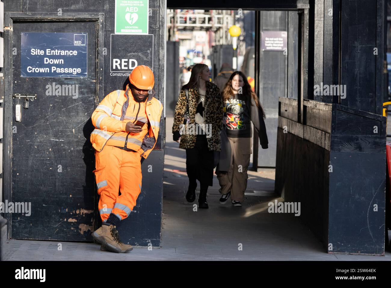 Construction workers on building project situated along Pall Mall in ...