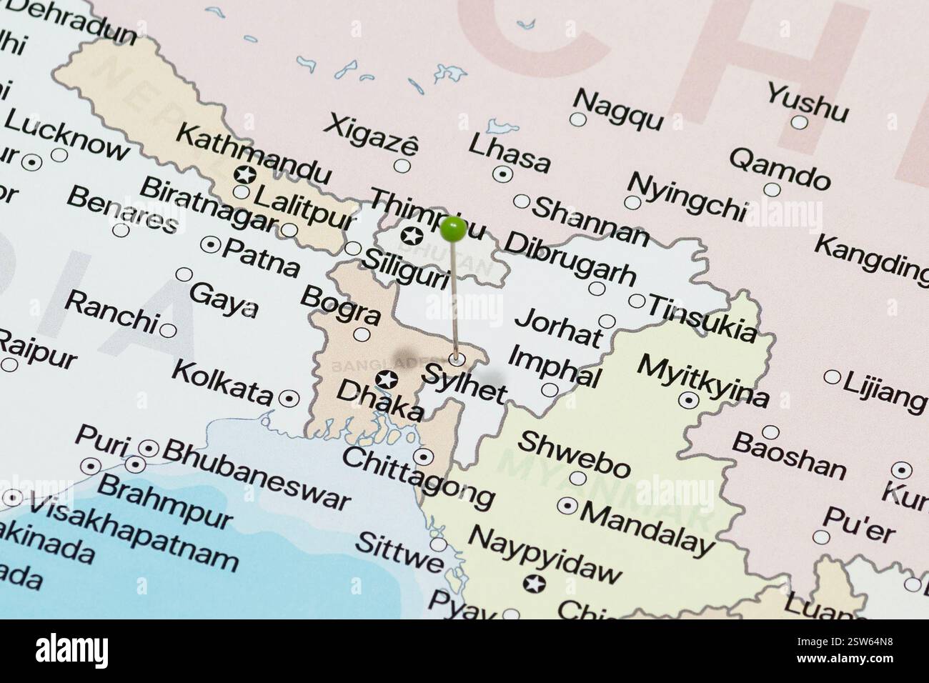 green pin needle into sylhet city of australia political map Stock Photo - Alamy