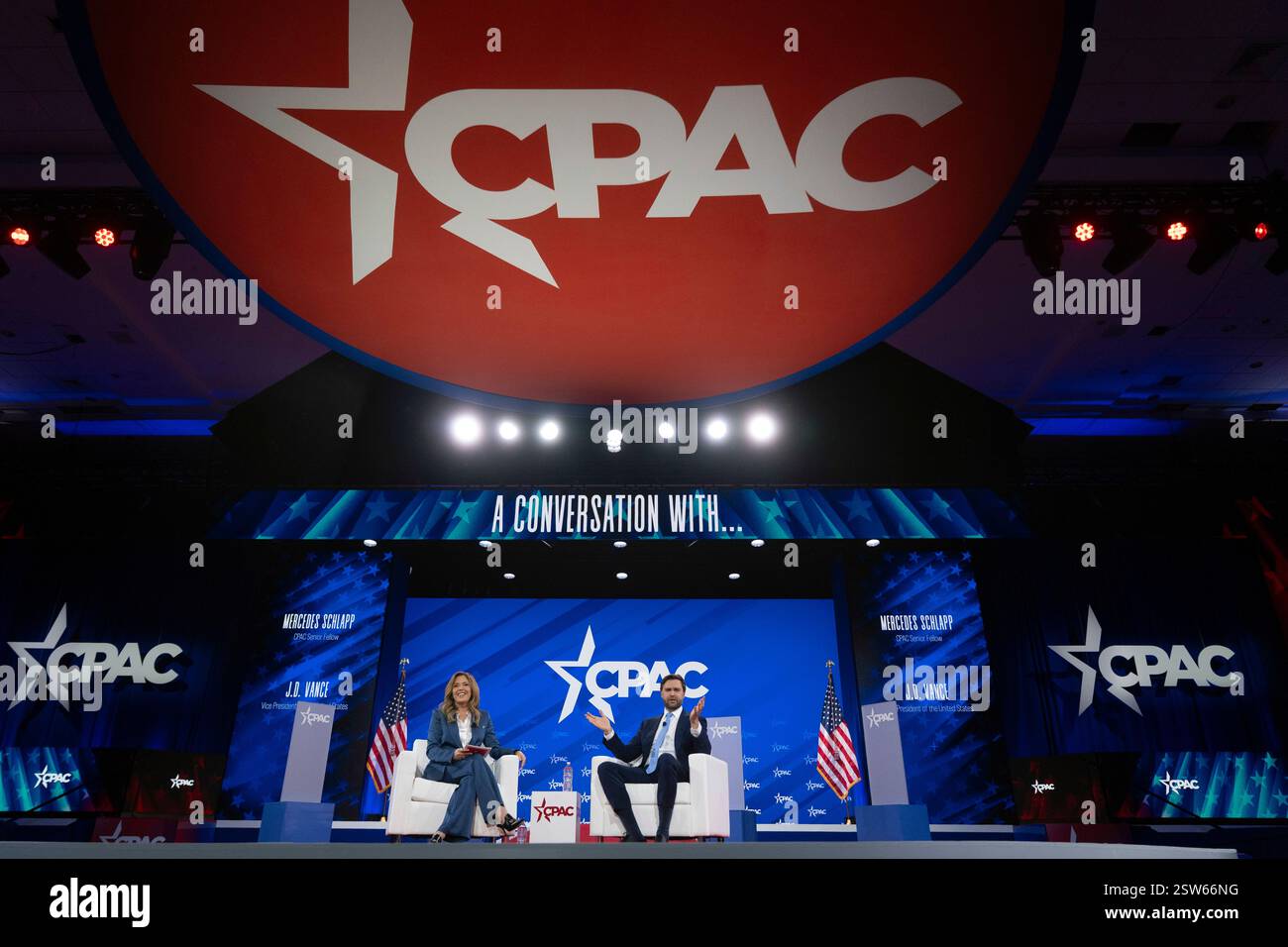 Vice President JD Vance, right with Mercedes Schlapp, speaks at the ...