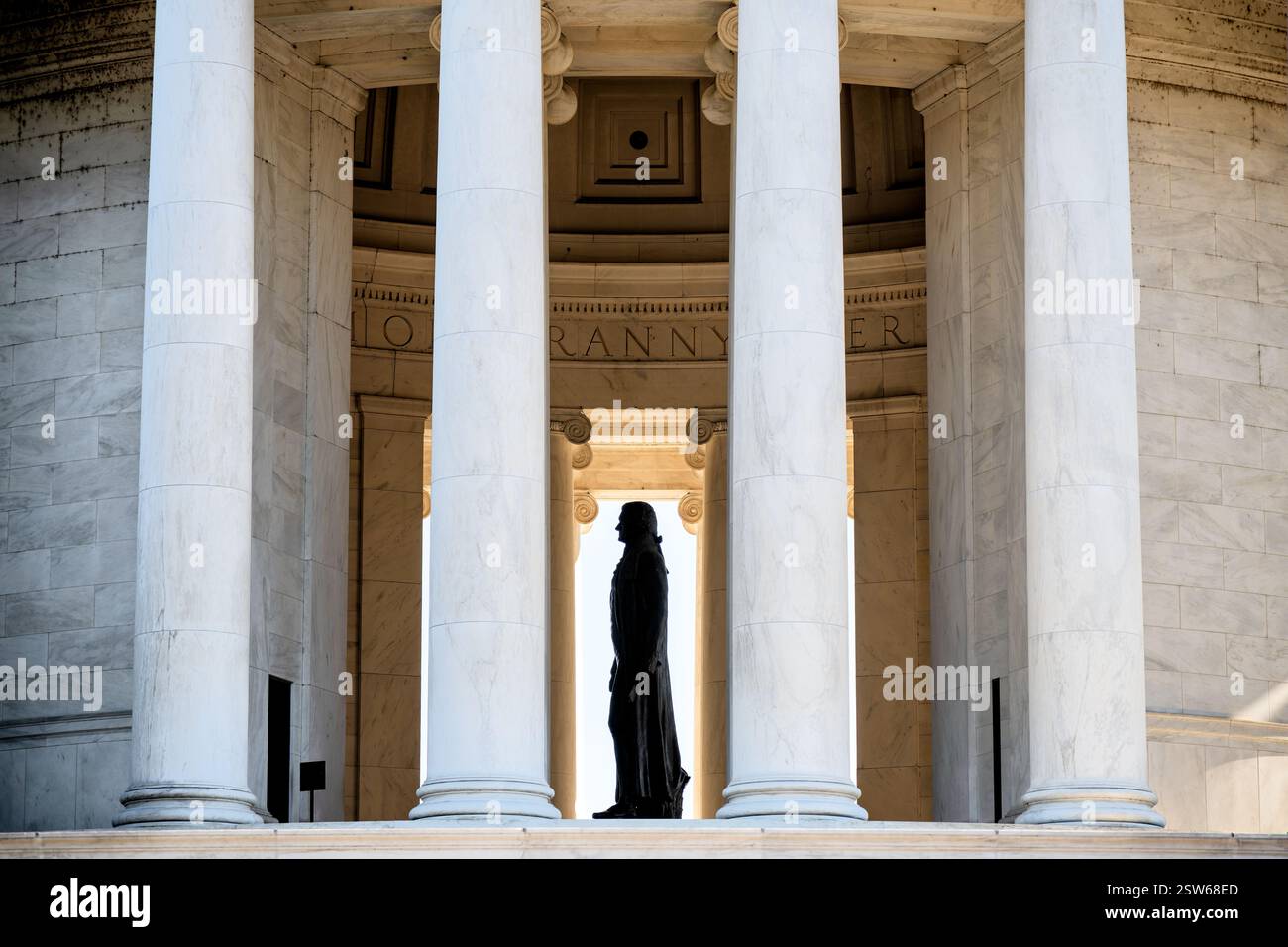 Walking between buildings silhouette hi-res stock photography and ...
