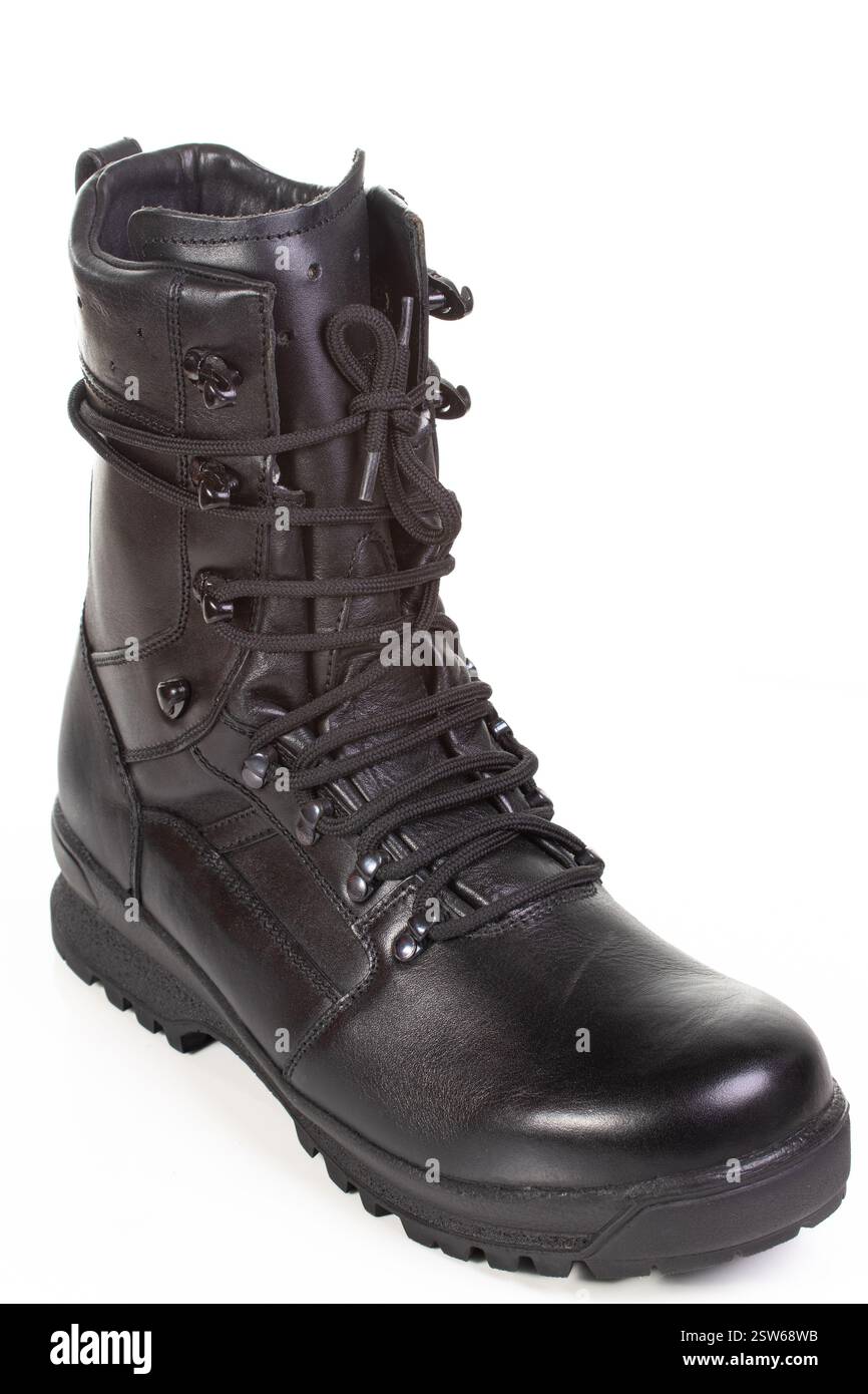 Detailed view of sturdy black military boots. Features included rugged ...
