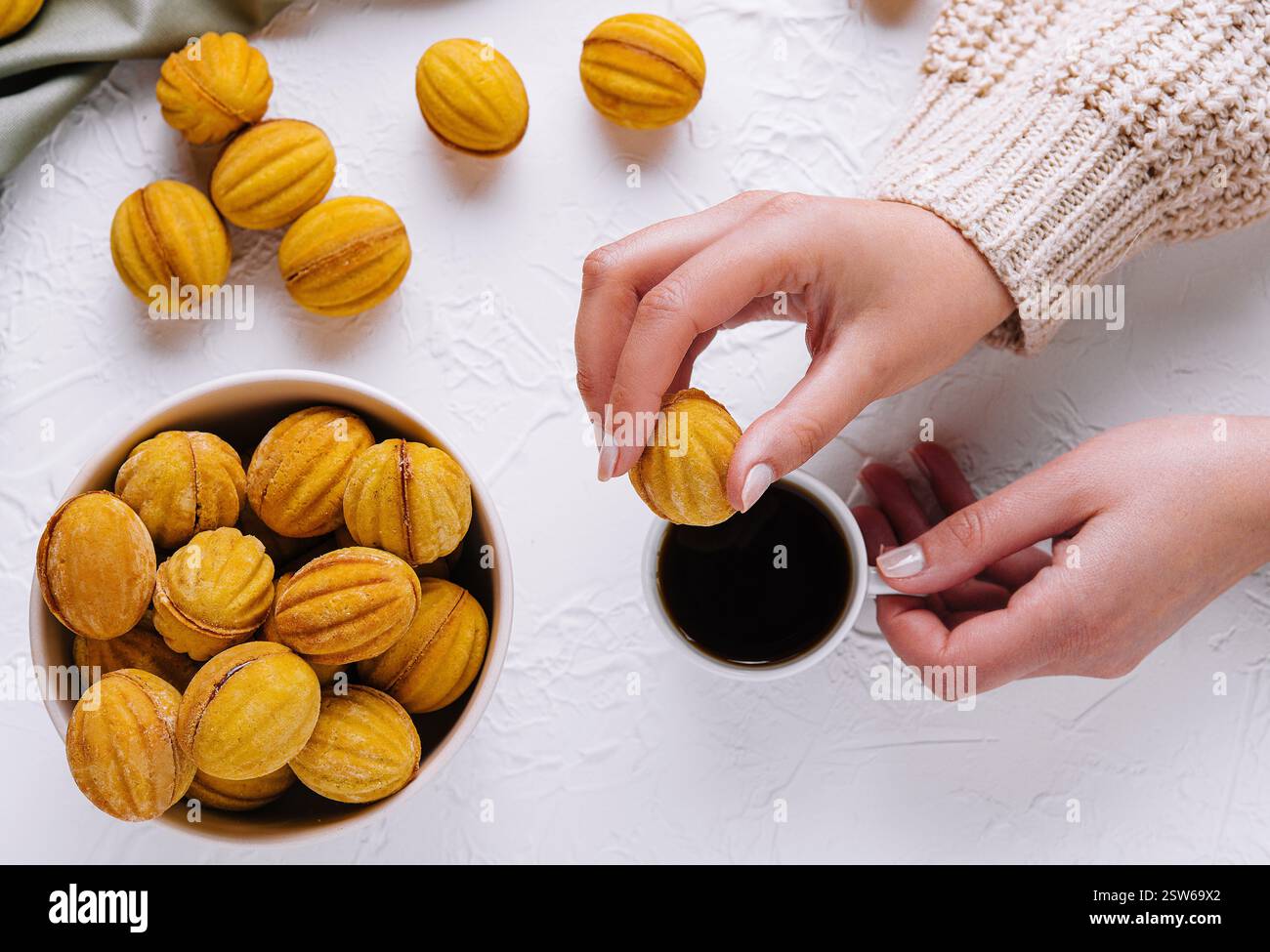 Hand picking cookie coffee hi-res stock photography and images - Alamy