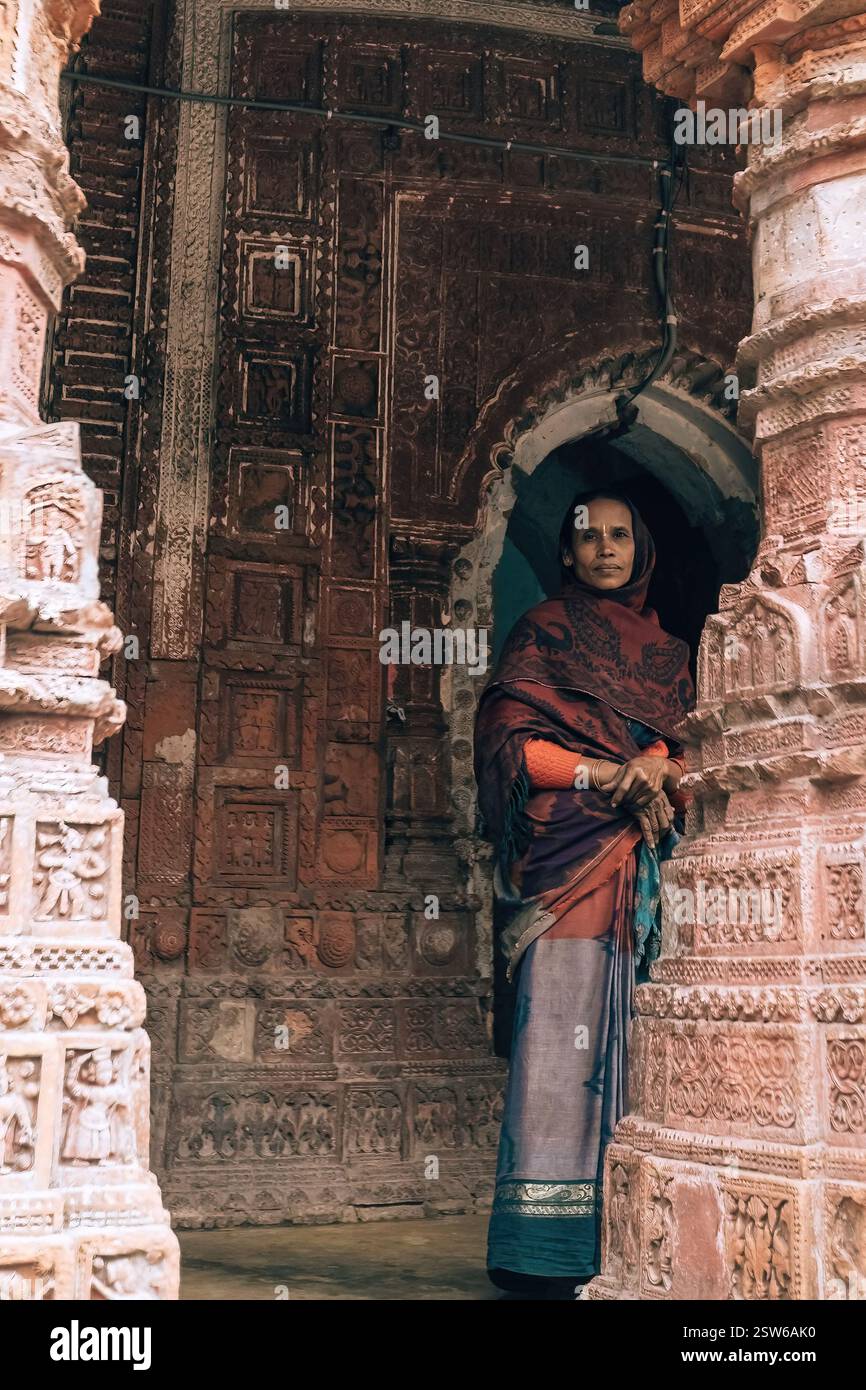 Hindu woman working in the ancient Hindu Pancharatna Temple (Temple of ...