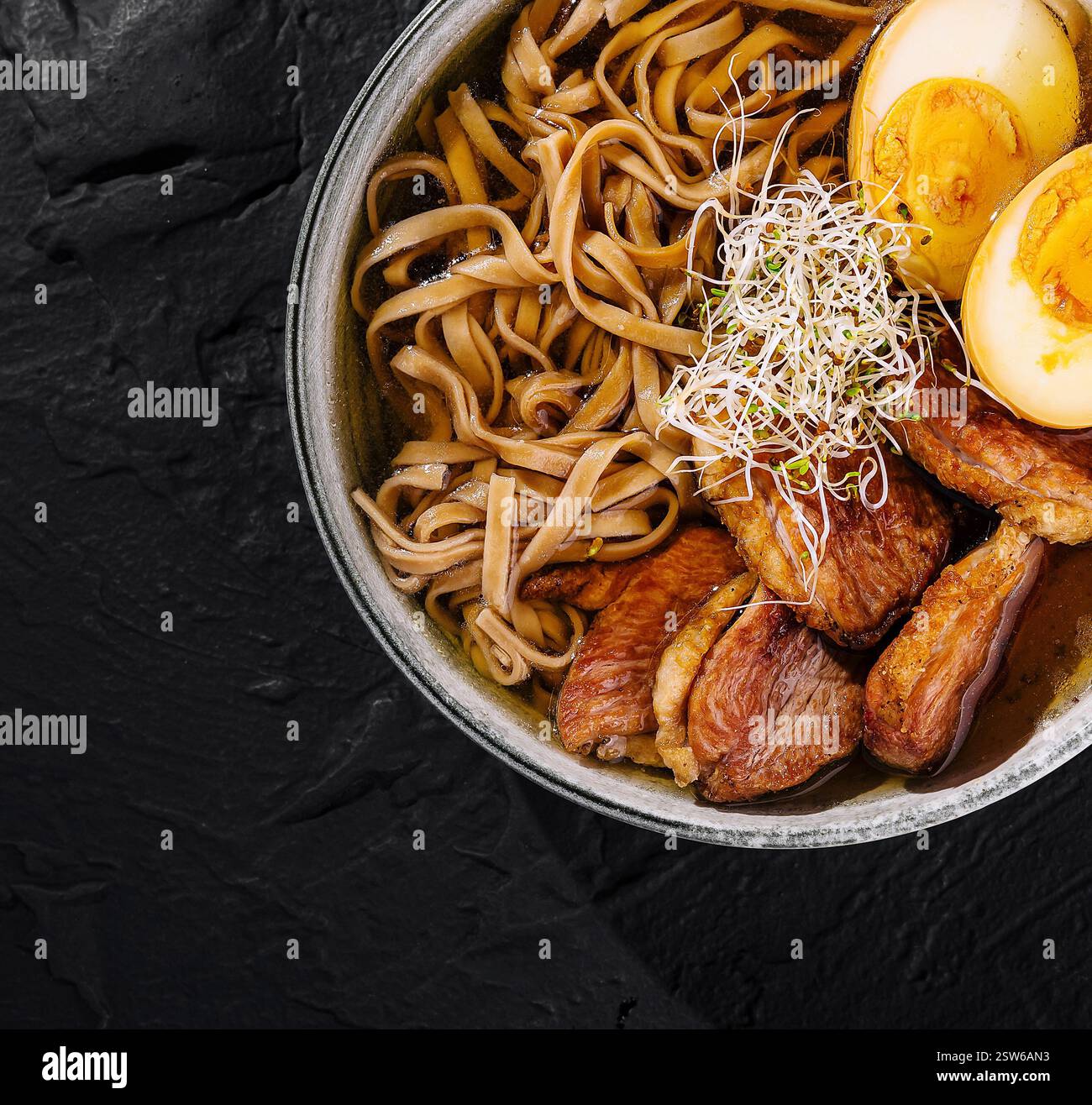 Savory ramen bowl with eggs and pork Stock Photo - Alamy