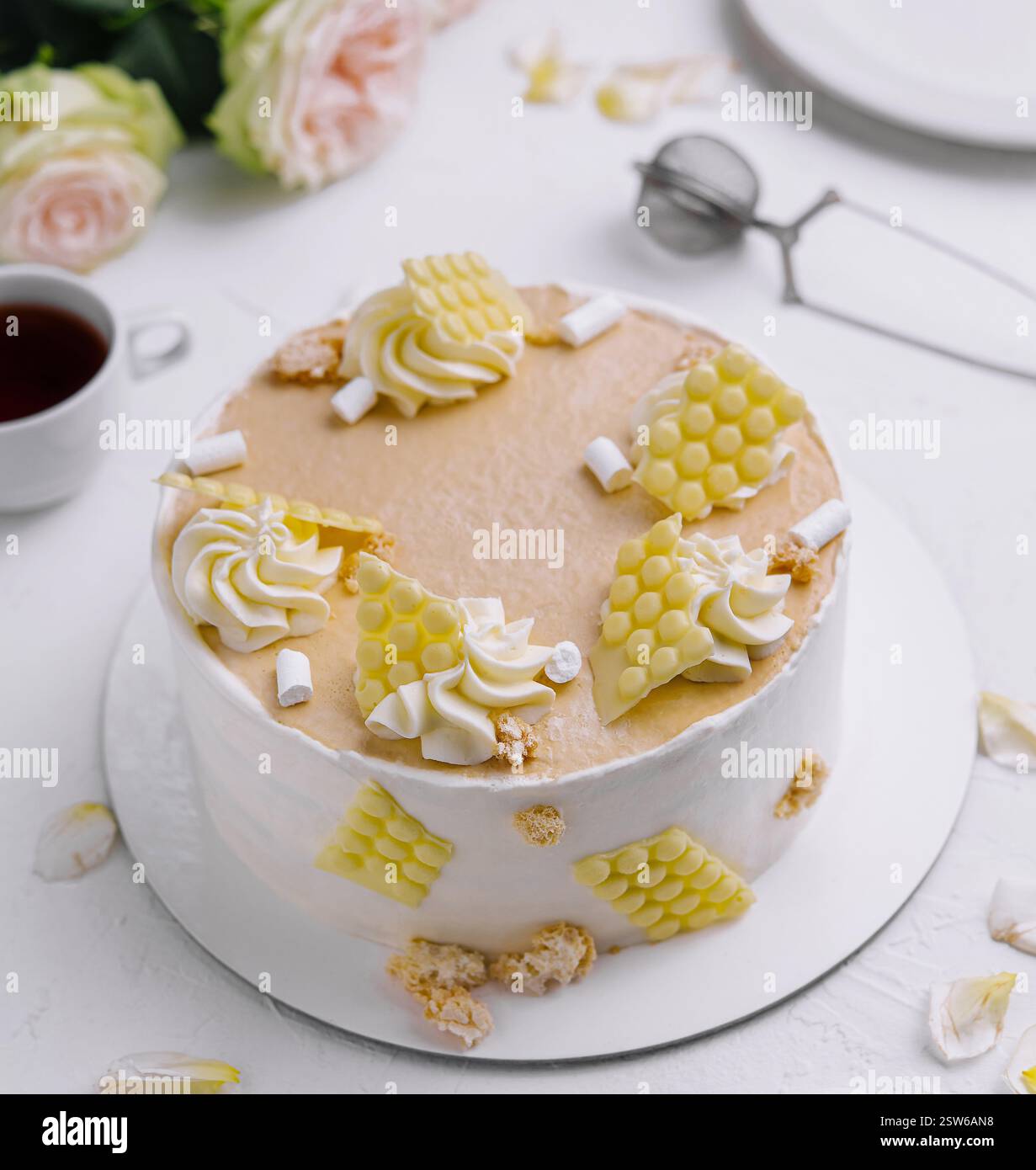 Elegant vanilla cake with whipped cream and honeycomb Stock Photo - Alamy