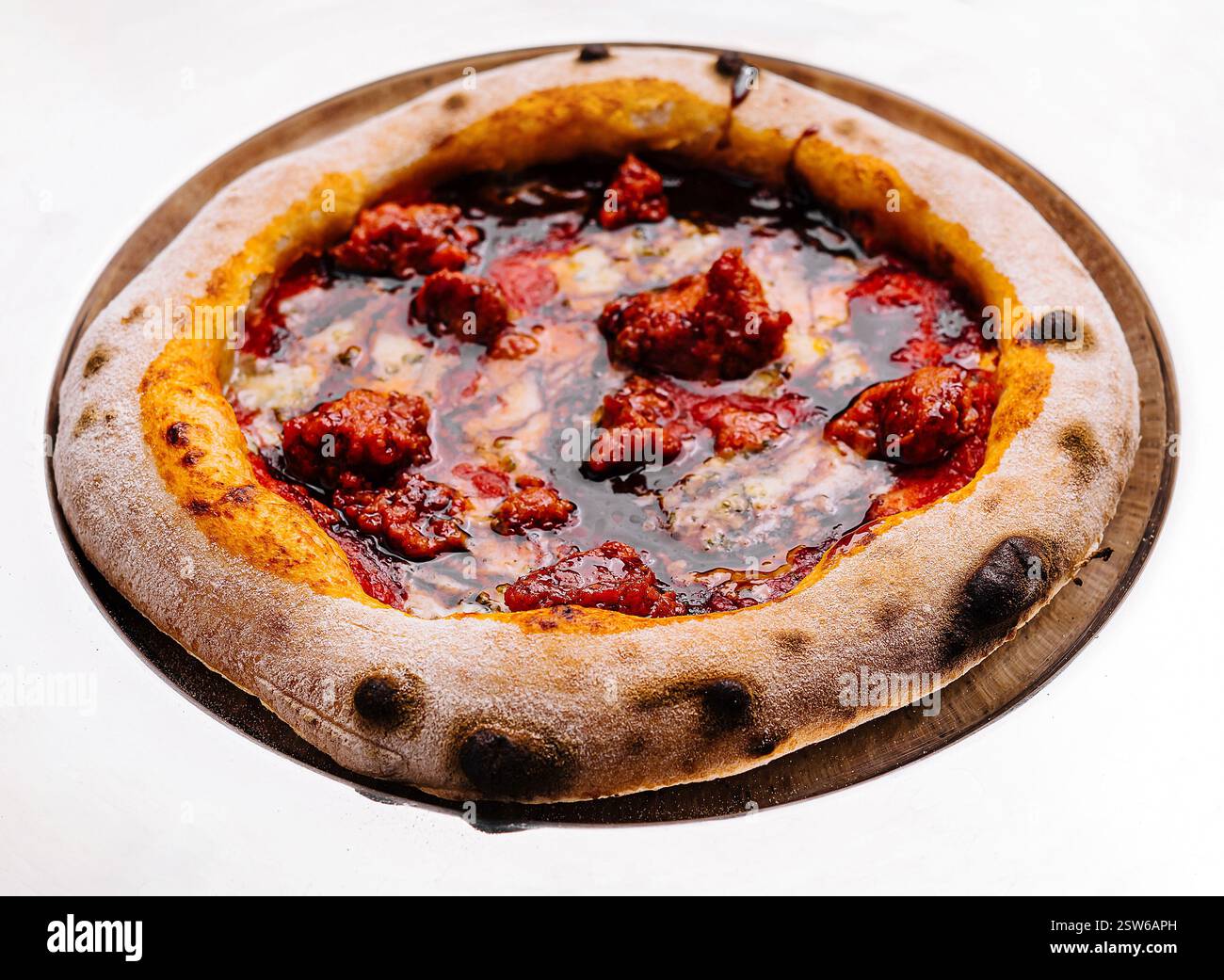 Artisan pepperoni pizza on white plate Stock Photo - Alamy