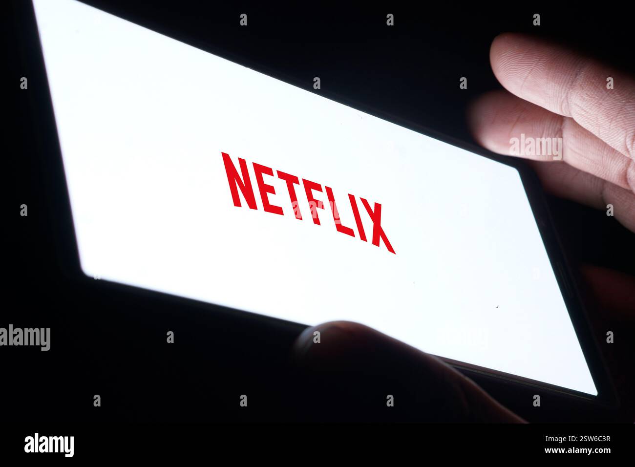 Dhaka, Bangladesh- 06 Oct 2024: Netflix logo is displayed on smartphone ...