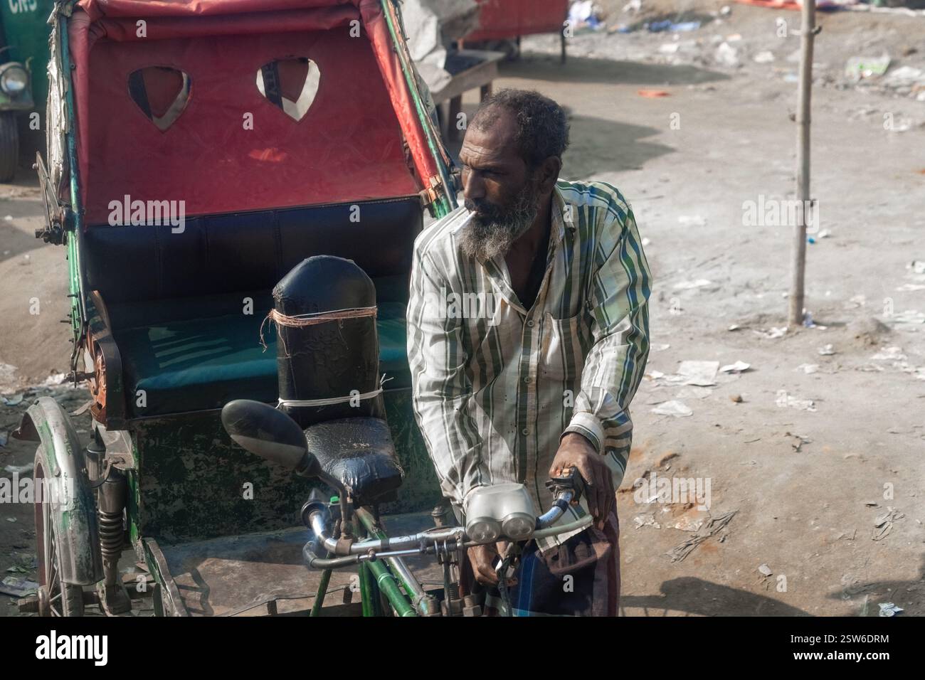 Bangladeshi cycling rickshaw hard work in Bangladesh poor people Stock ...