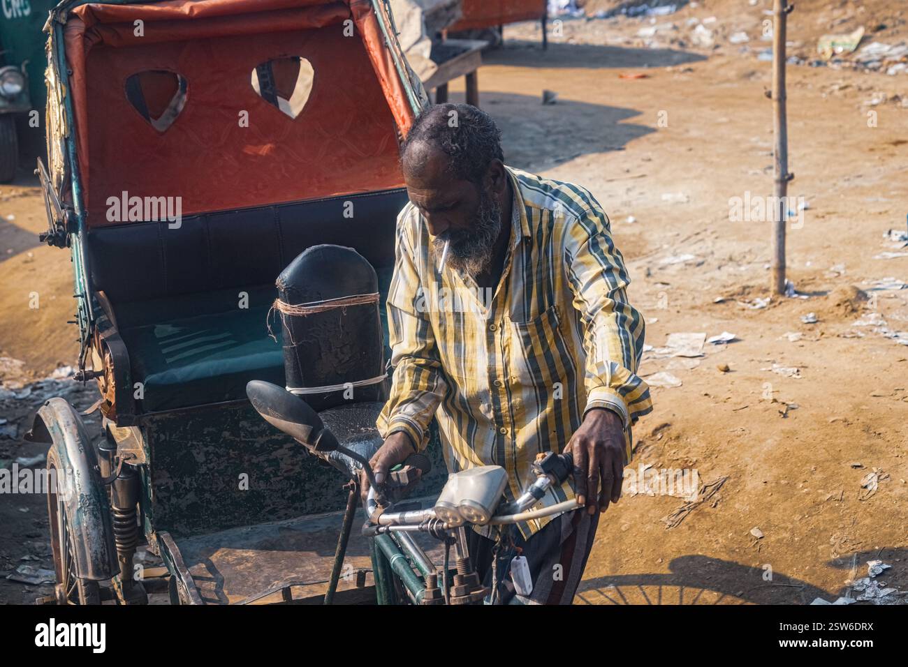 Bangladeshi cycling rickshaw hard work in Bangladesh poor people Stock ...