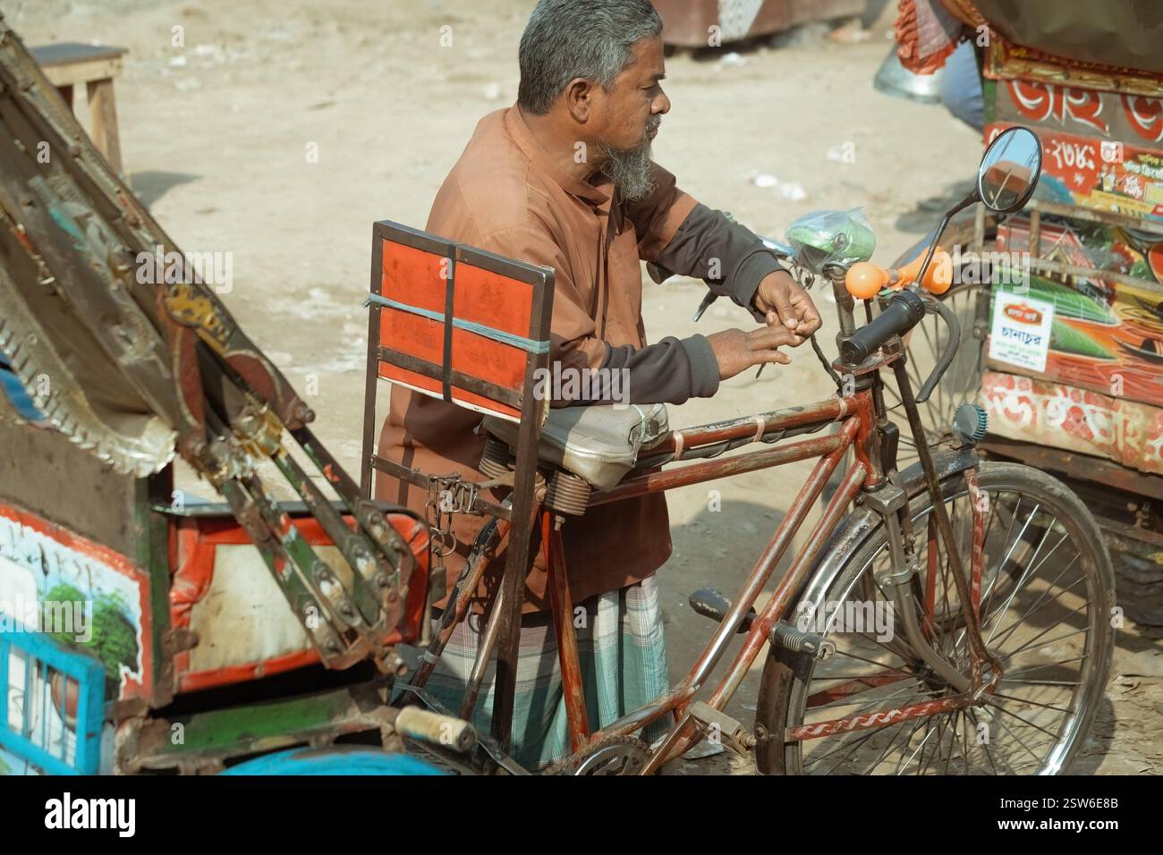 Bangladeshi cycling rickshaw hard work in Bangladesh poor people Stock ...