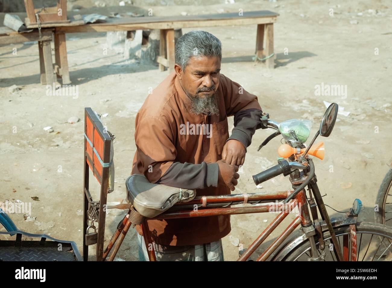 Bangladeshi cycling rickshaw hard work in Bangladesh poor people Stock ...