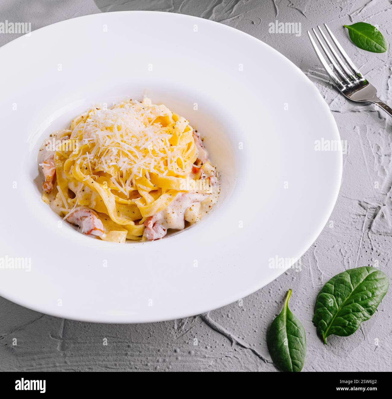 Fettuccine alfredo on white hi-res stock photography and images - Alamy