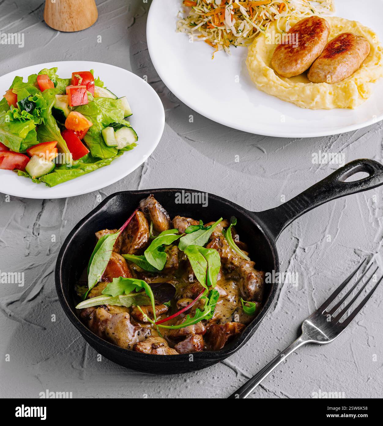 Trio of nutritious gourmet dishes elegantly presented on a table hi-res ...