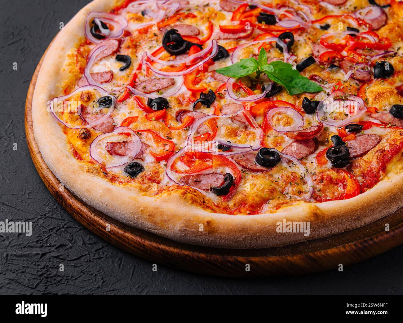 Delicious italian pepperoni pizza with fresh toppings Stock Photo - Alamy