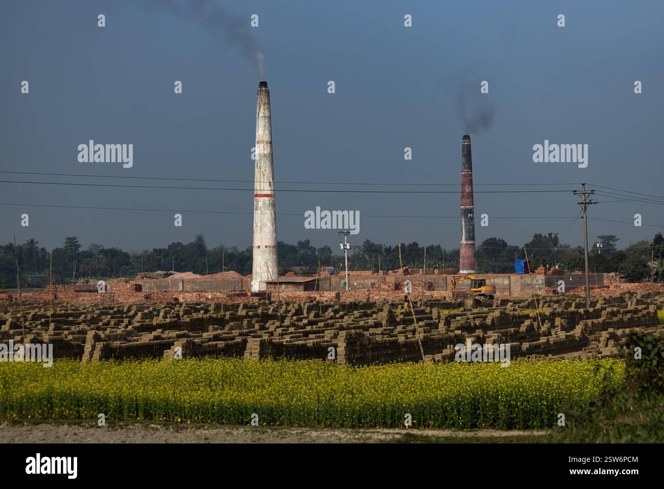 Brick production in Bangladesh, factory producing bricks Stock Photo ...