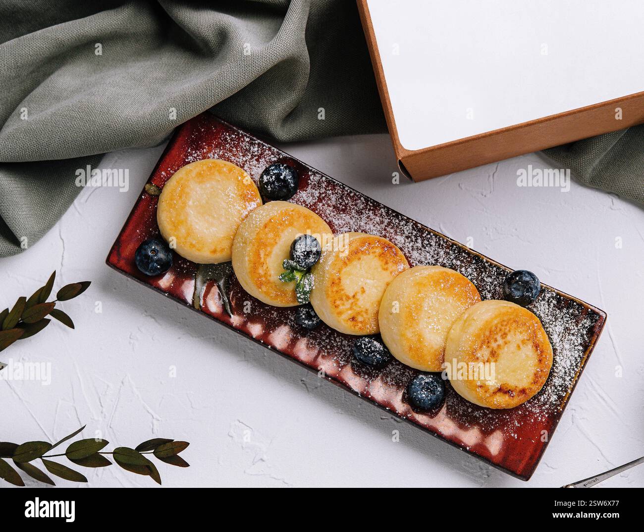 Elegant dessert presentation with blank menu card Stock Photo - Alamy