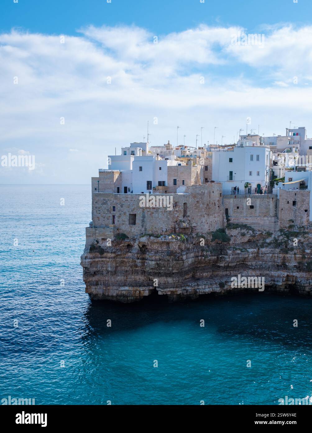 Explore Puglia's coastal beauty, with its charming white buildings and ...