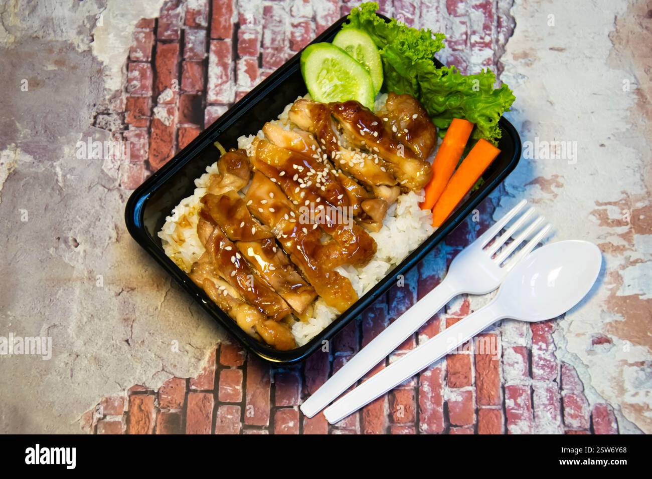 Asian Fusion Teriyaki Chicken Rice Stock Photo - Alamy