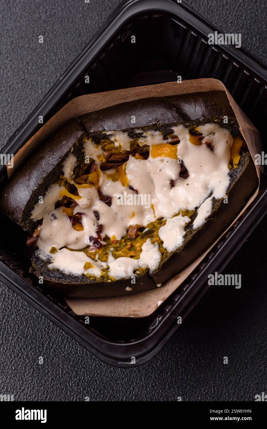 Sandwich with brioche bun, roast beef and vitello tonato sauce Stock ...