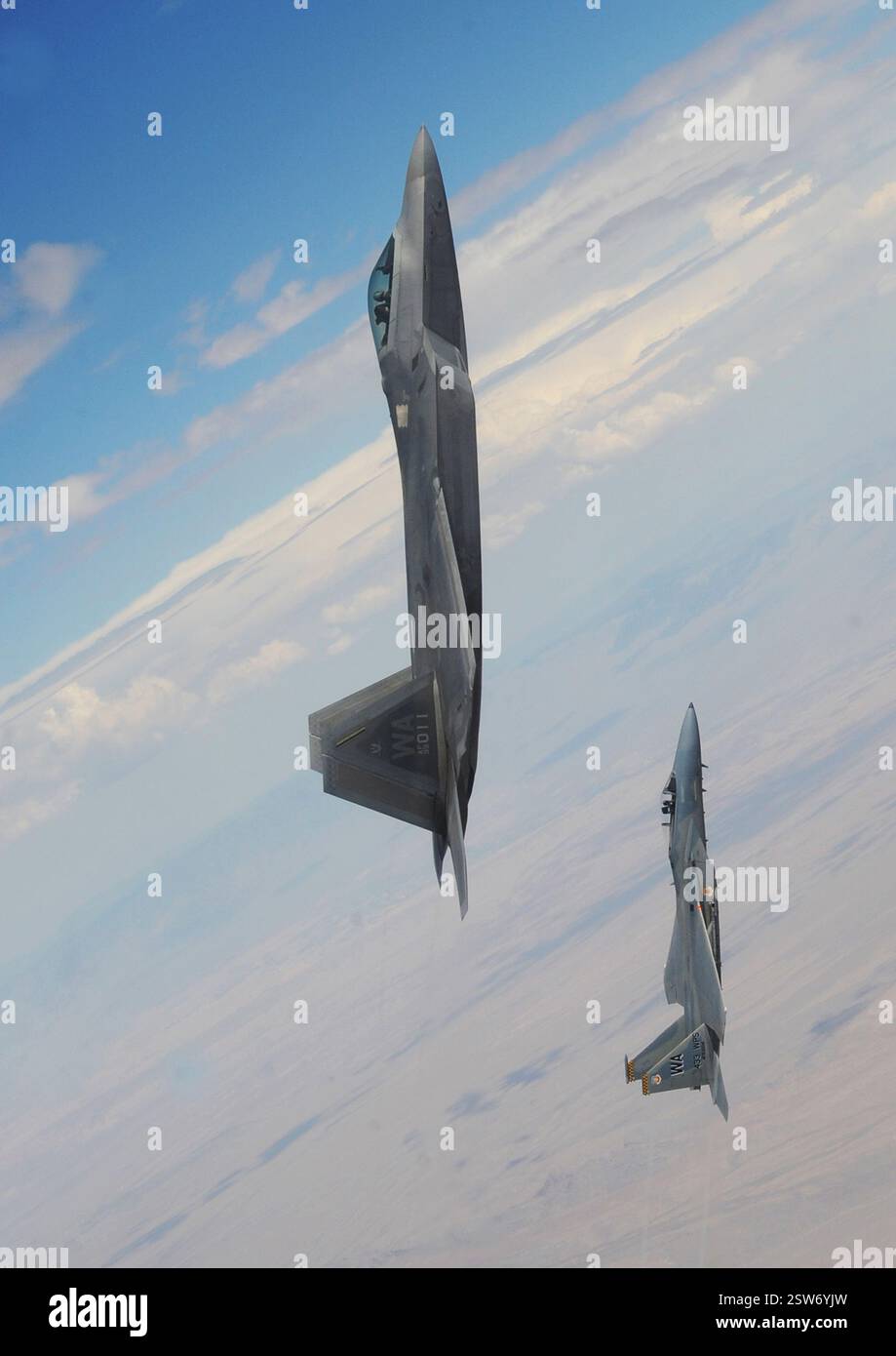 An F-22 Raptor and F-15 Eagle from the U.S. Air Force Weapons School ...