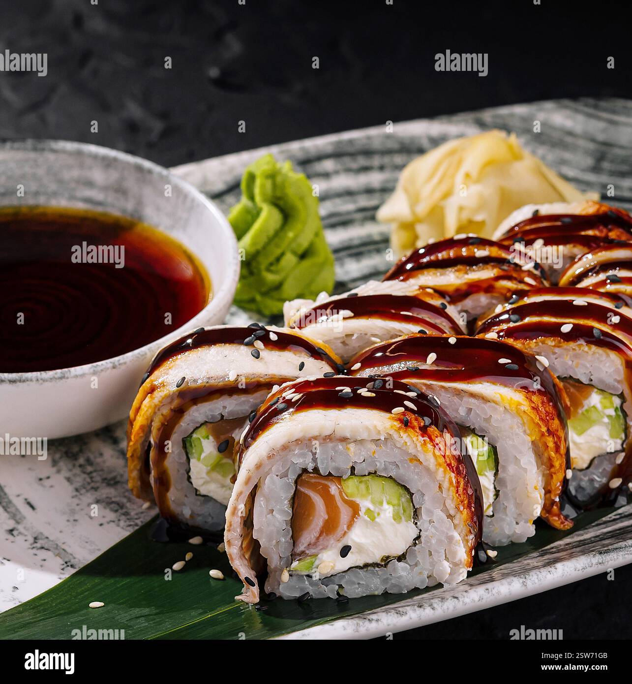 Delectable sushi roll platter with dipping sauce Stock Photo - Alamy