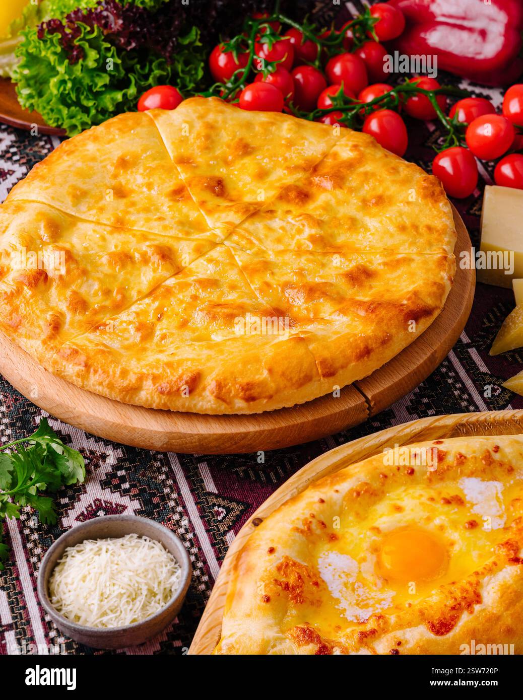 Traditional georgian cuisine: khachapuri and pizza Stock Photo - Alamy