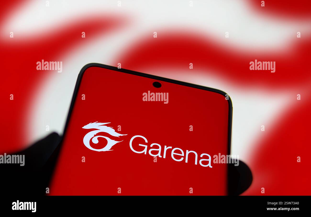 Dhaka, Bangladesh- 10 Oct 2024: Garena logo is displayed on smartphone ...