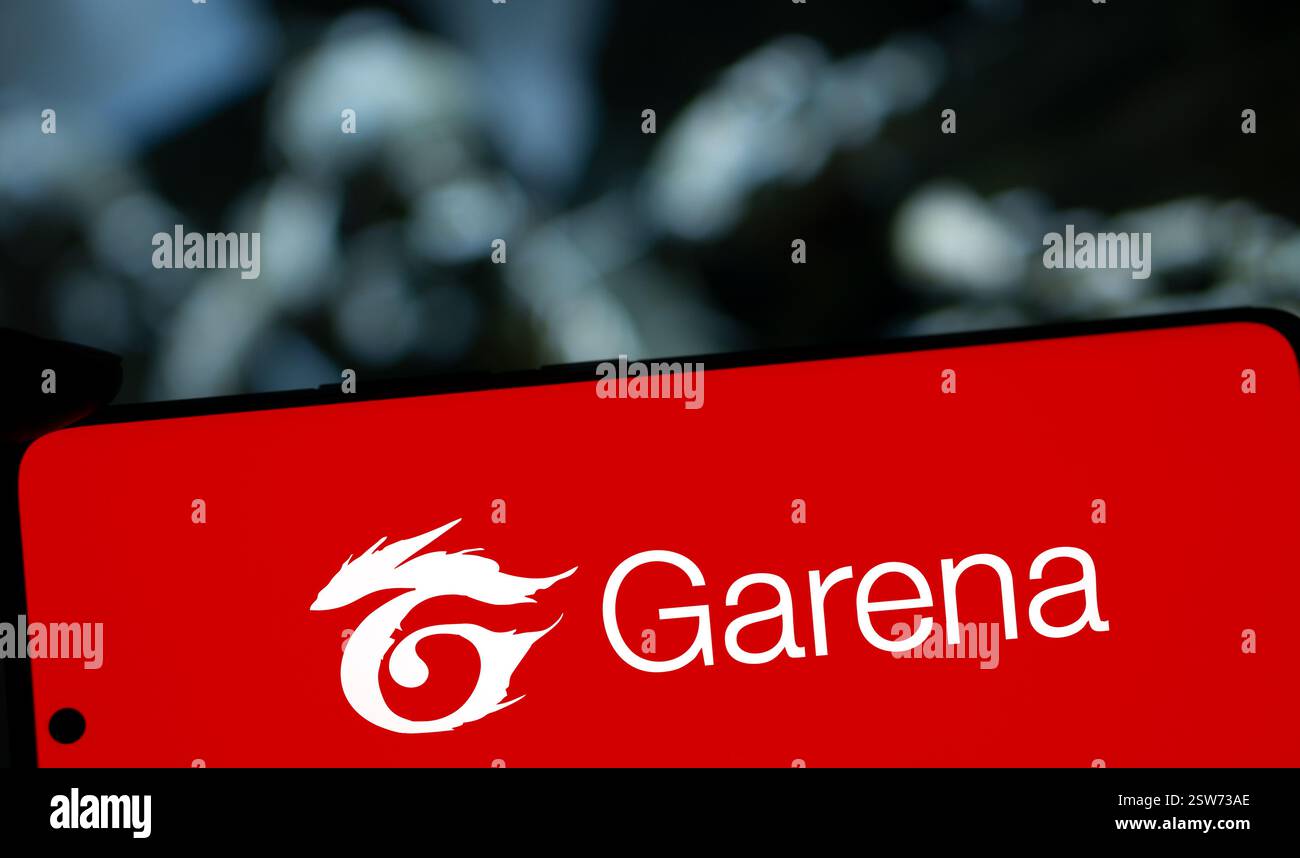Dhaka, Bangladesh- 10 Oct 2024: Garena logo is displayed on smartphone ...