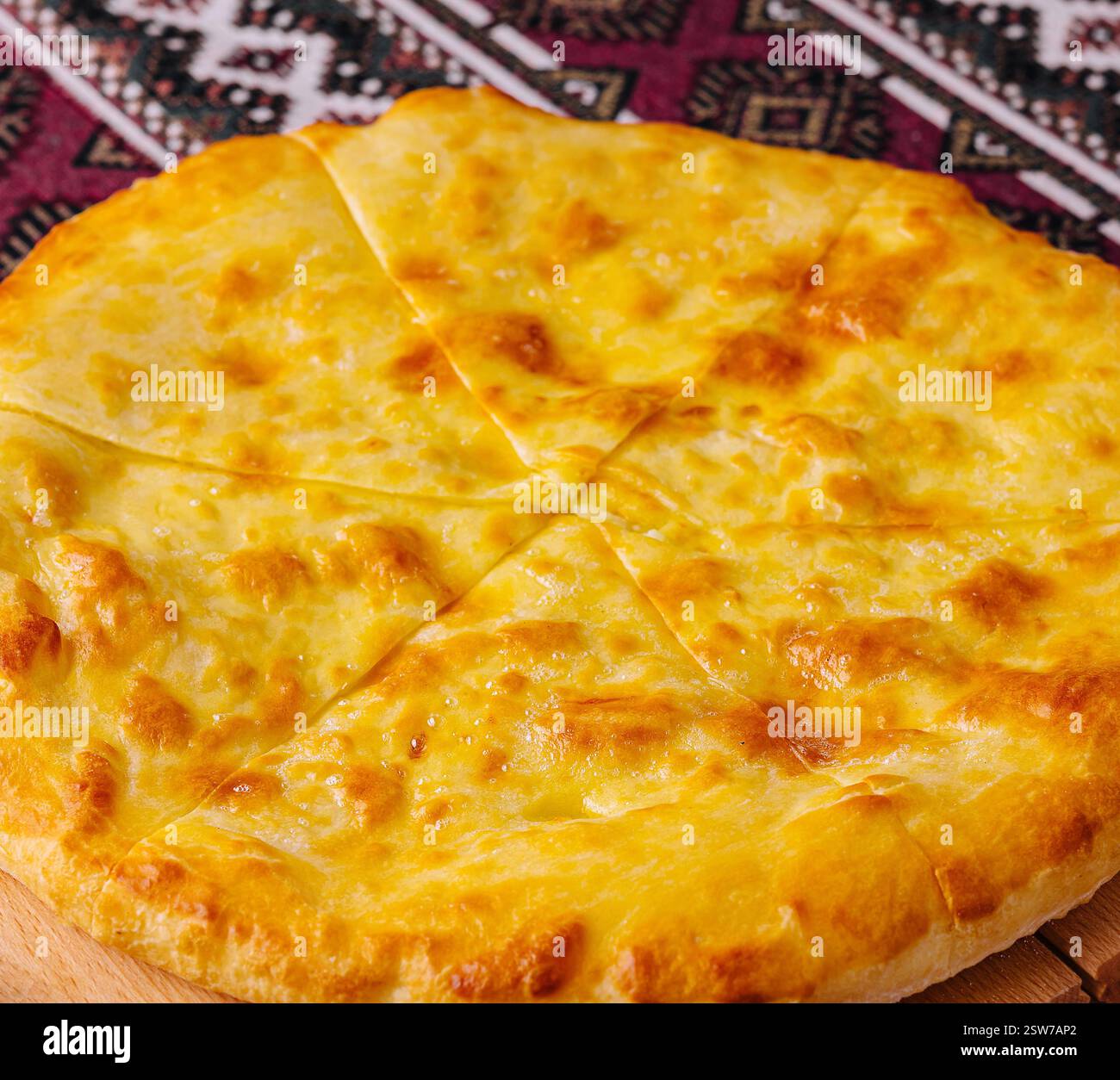 Traditional georgian cheese bread khachapuri on wooden board Stock ...
