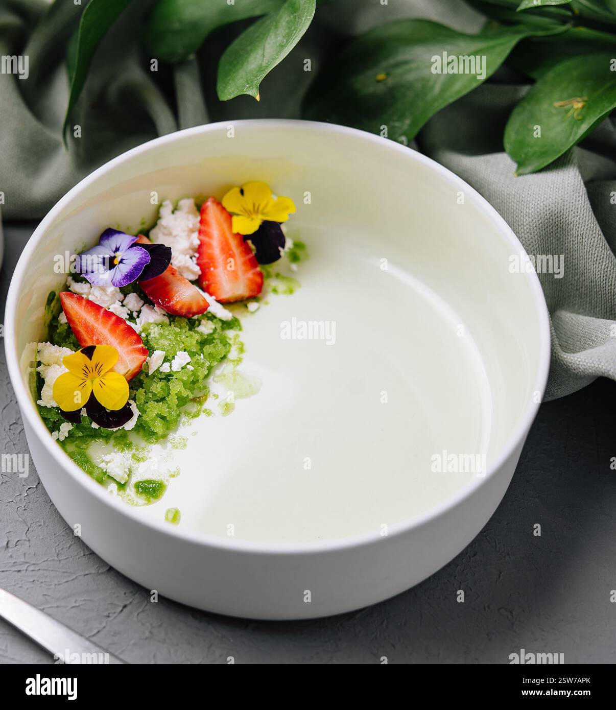 Healthy breakfast bowl with edible flowers Stock Photo - Alamy