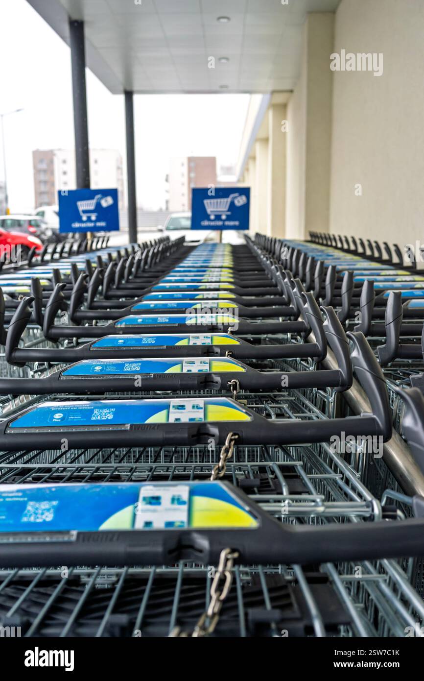 Advertising signs on the shopping carts for groceries from Lidl ...