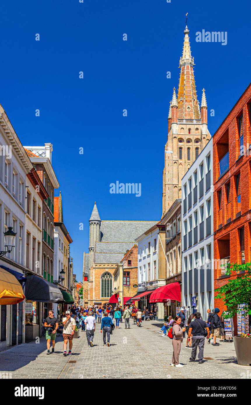 Bruges, Belgium, July 5, 2023: crowd of people tourists walking down ...