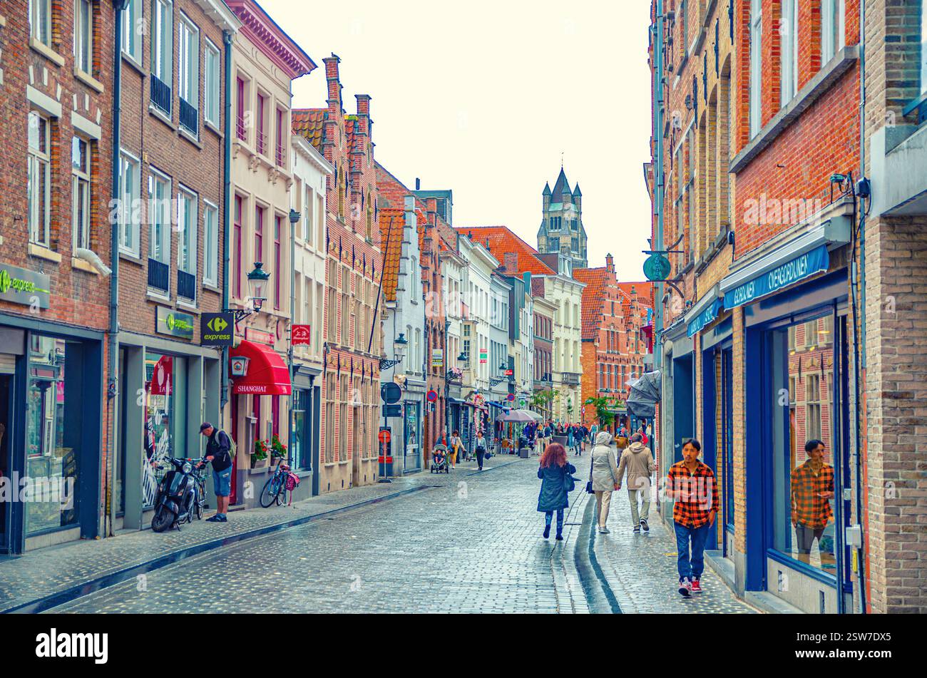 Bruges, Belgium, July 5, 2023: people walking down pedestrian street ...
