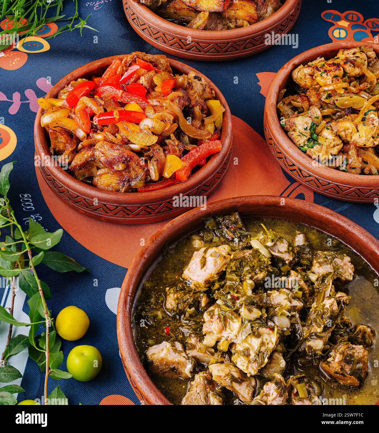 Traditional african stews in clay pots Stock Photo - Alamy