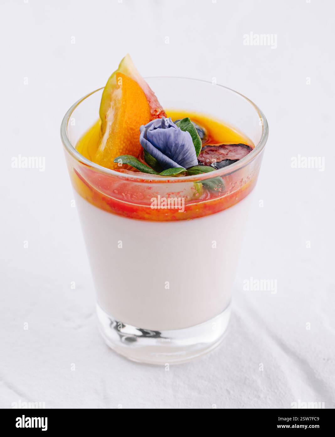 Gourmet panna cotta with fruit garnish Stock Photo - Alamy