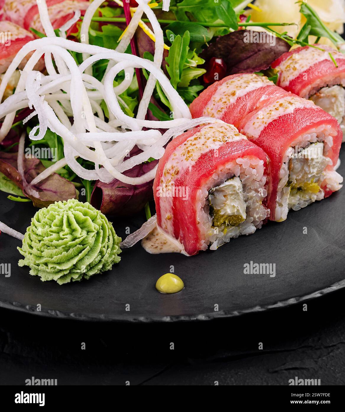 Gourmet sushi roll platter on black slate Stock Photo - Alamy