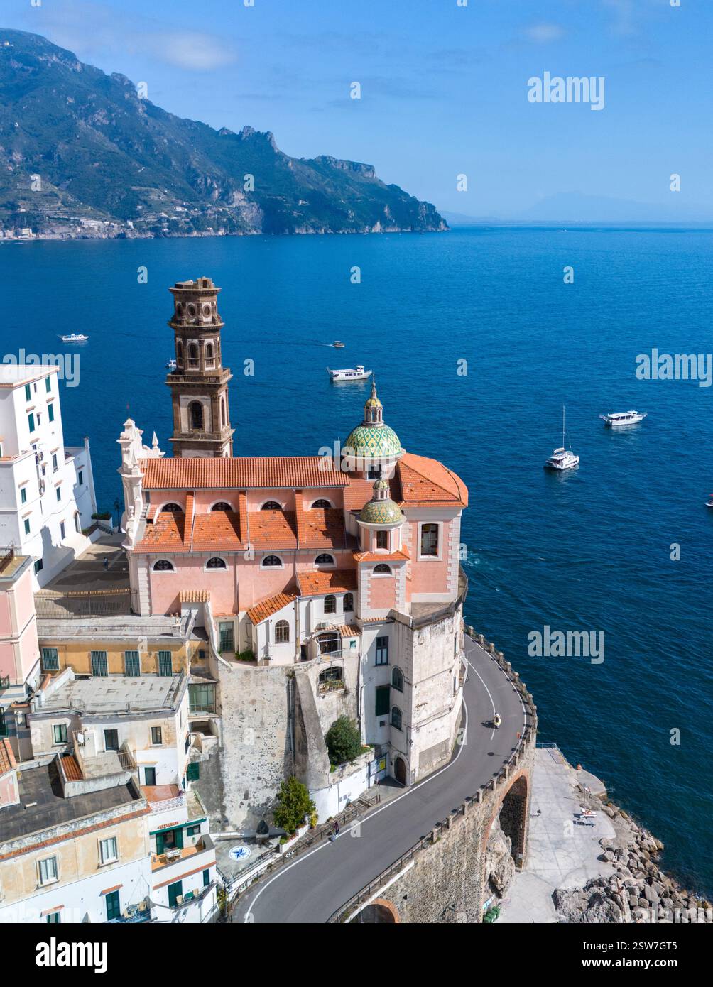 Breathtaking coastal view of Amalfi coast in Italy with colorful buildings and serene waters ...