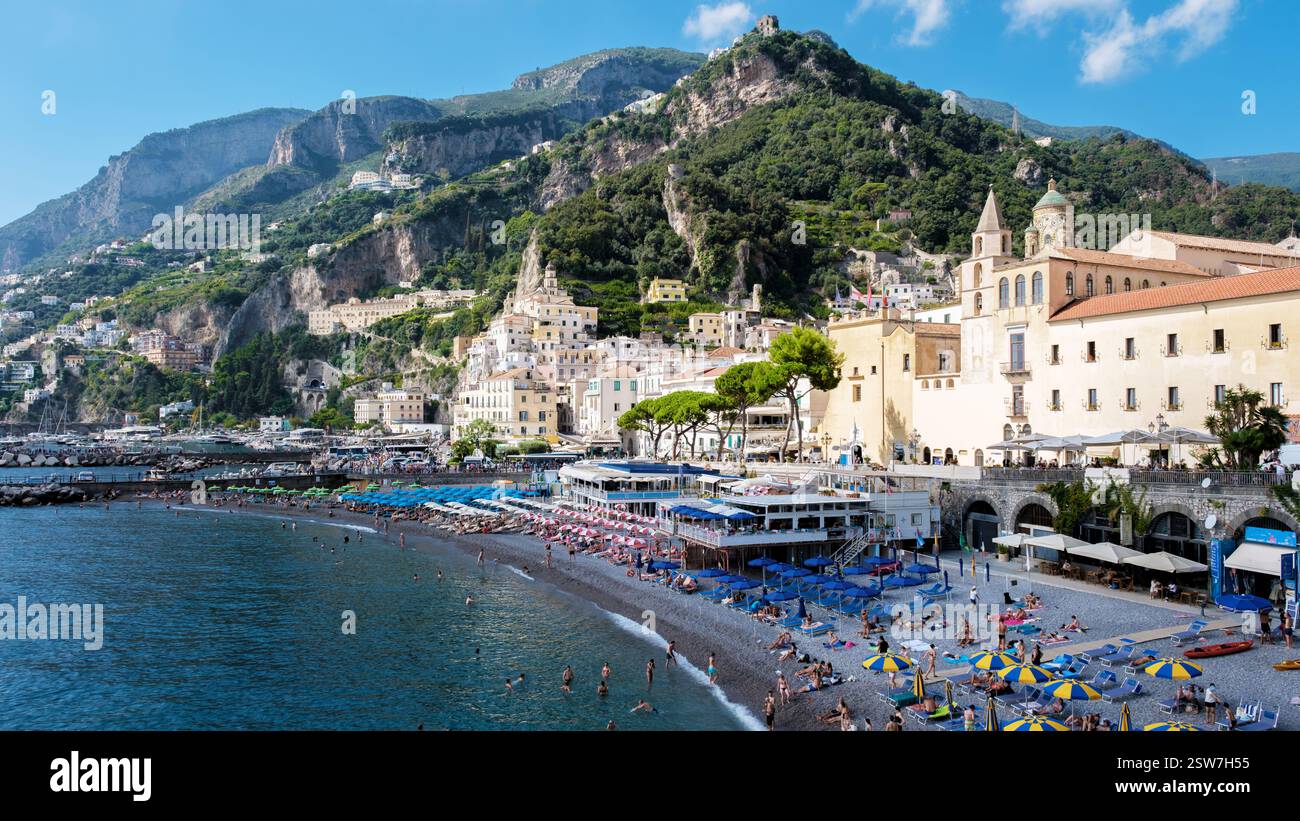 Explore the vibrant beauty of the Amalfi Coast with bustling beach life ...
