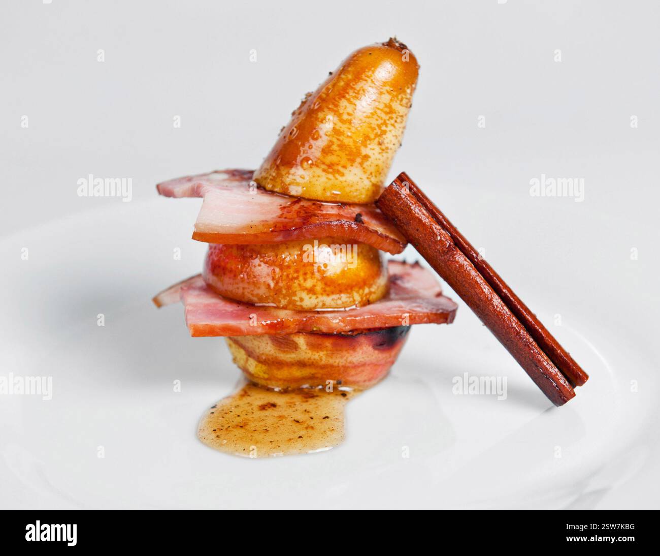 Gourmet spiced pear and ham stack Stock Photo - Alamy