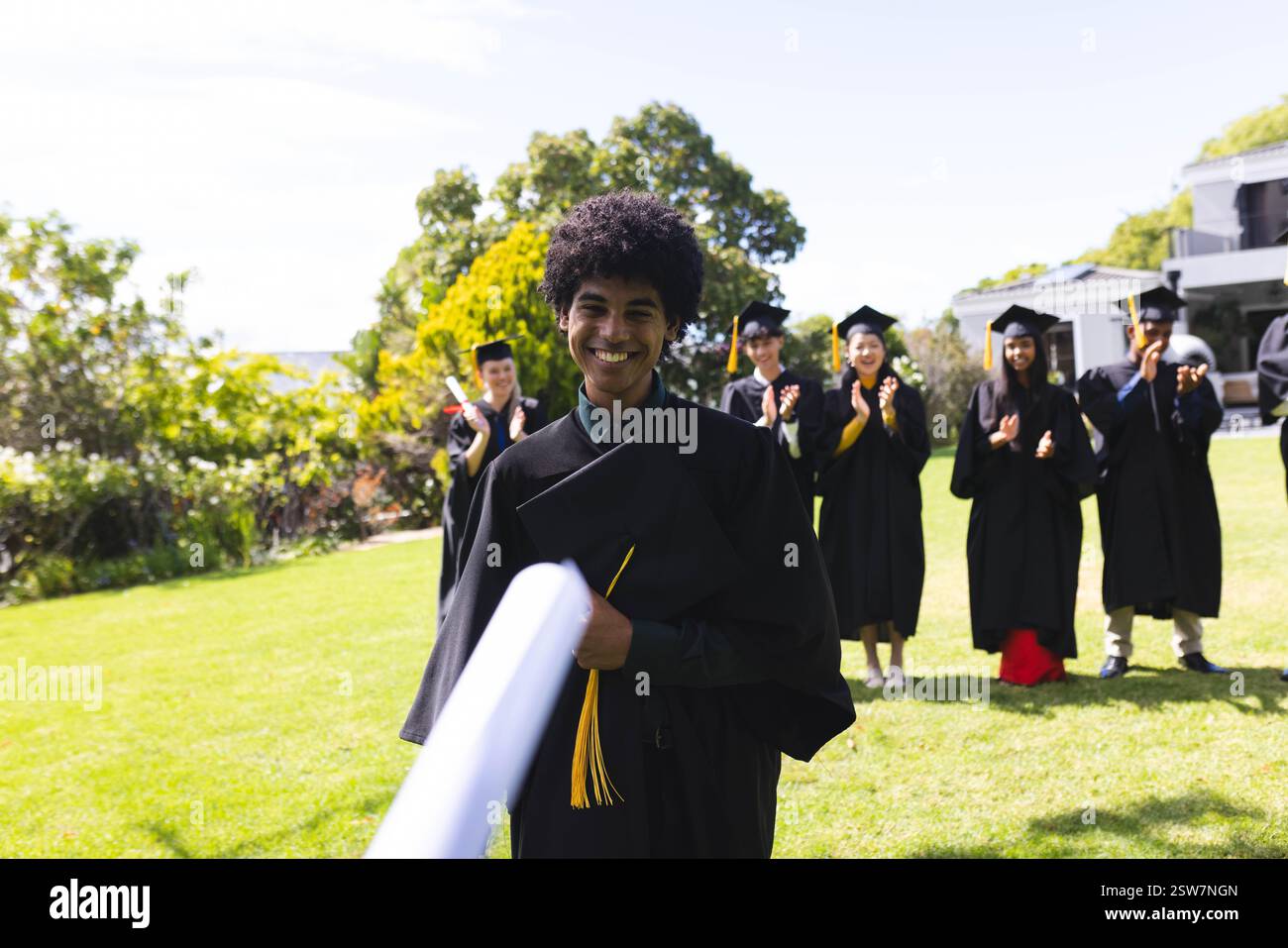 Receiving diploma hi-res stock photography and images - Alamy