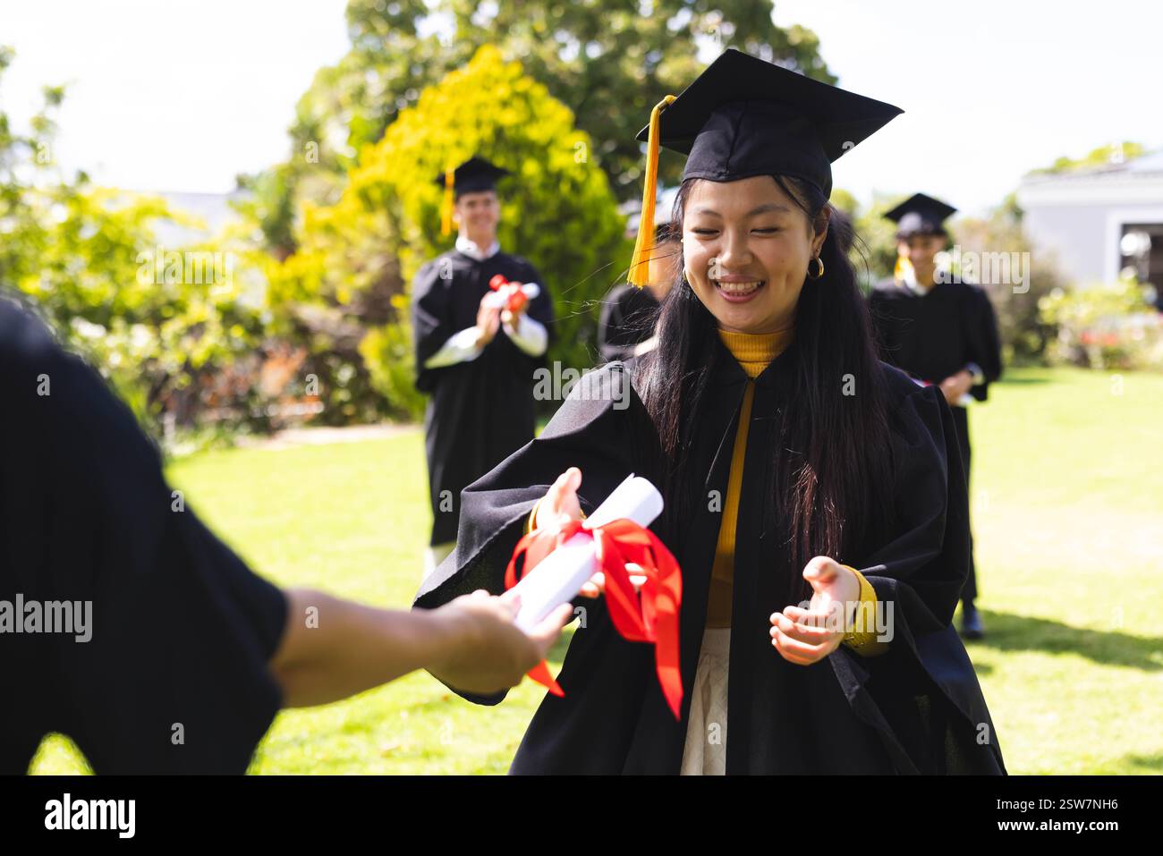 Receiving diploma hi-res stock photography and images - Alamy